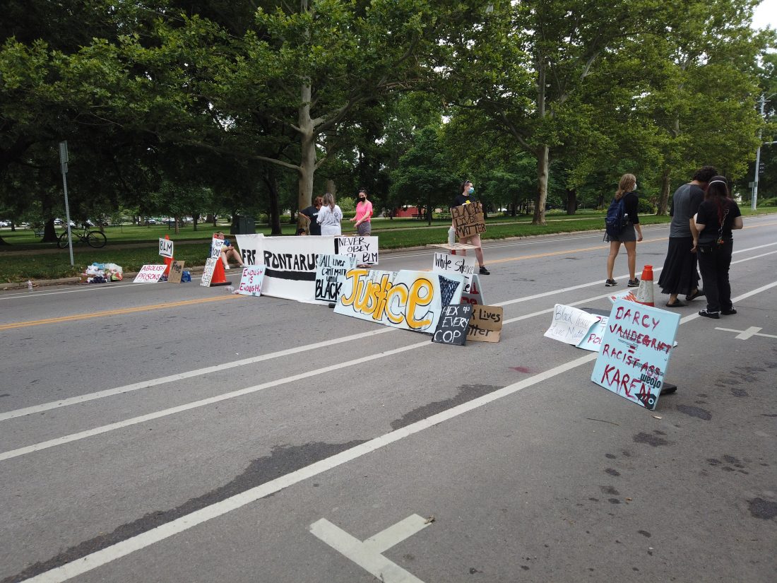 Protesters gather in Lawrence after graphic, racist banner is found ...